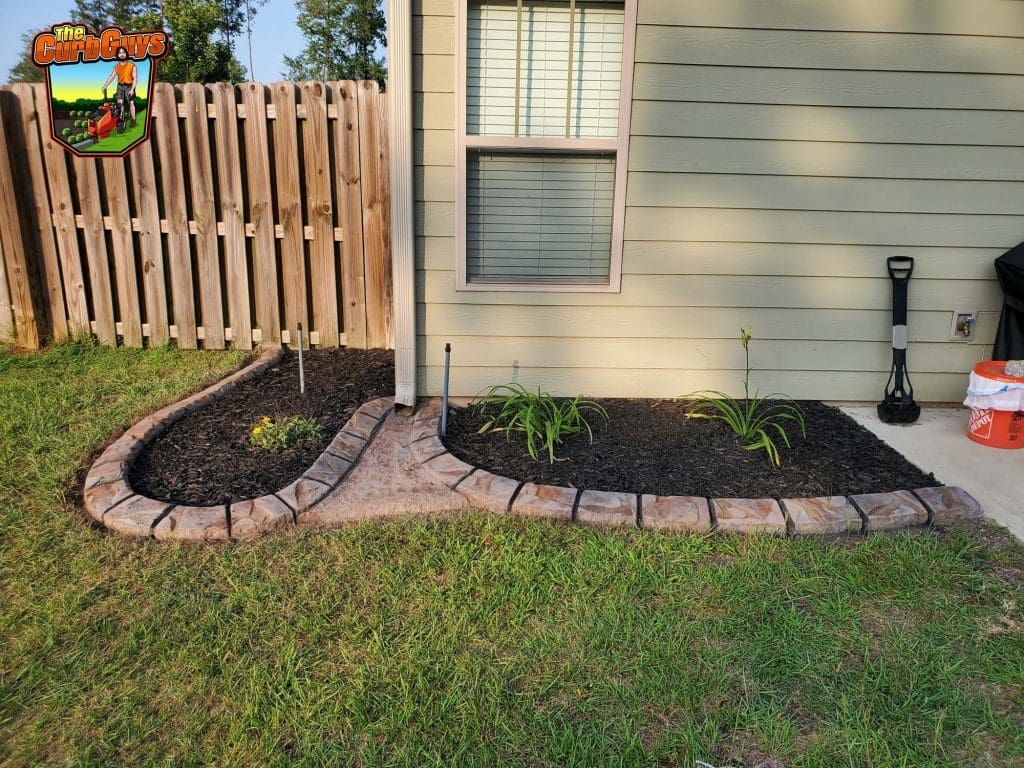 Custom Concrete Gutter Downspout Extension Splash Pads | The Curb Guys