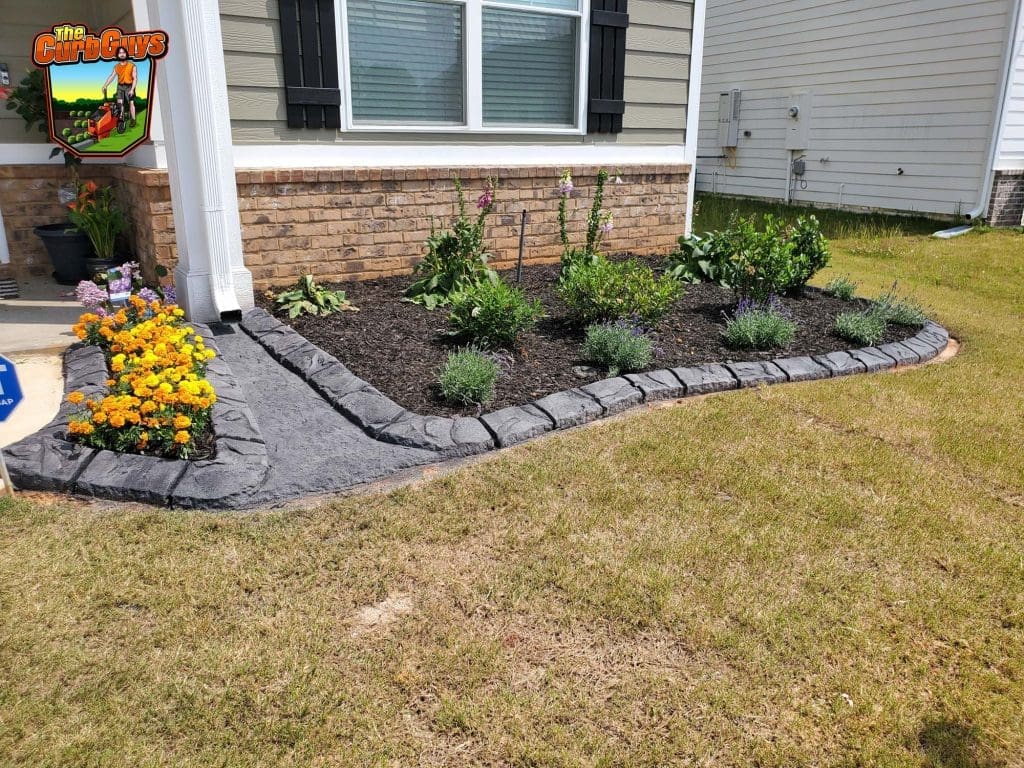 Custom Concrete Gutter Downspout Extension Splash Pads | The Curb Guys